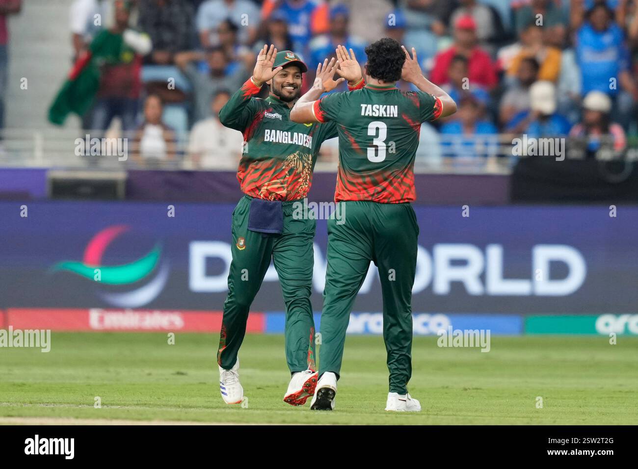 Bangladesh's Taskin Ahmed, right, celebrates with a teammate after the ...