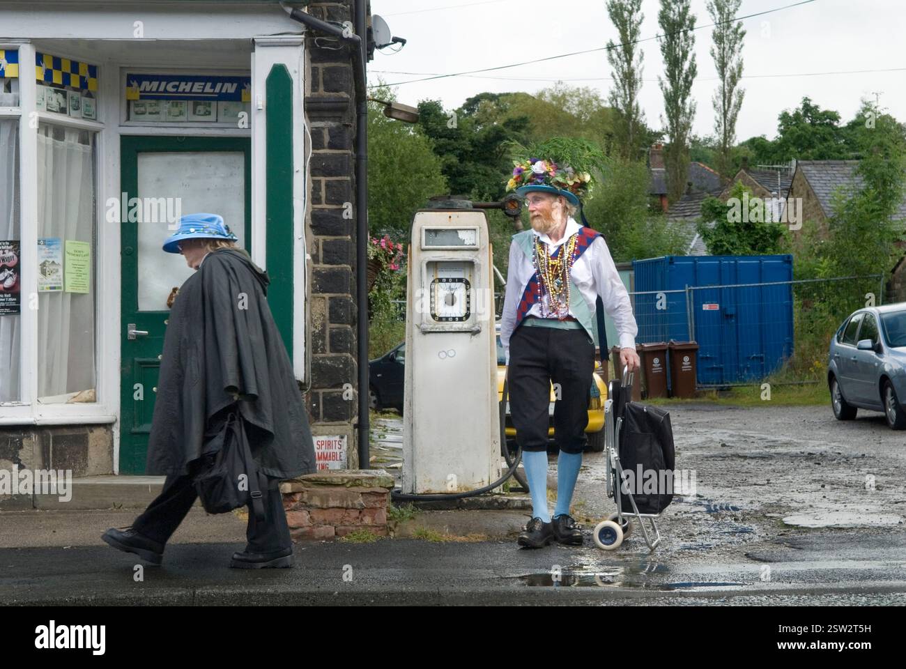 Couple argument UK. Morris man with shopping trolley and his wife, who ...