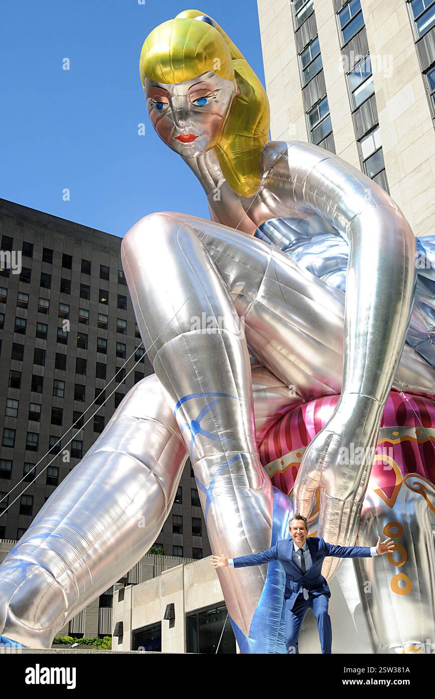 Artist Jeff Koons unveiled his 45 foot tall inflatable sculpture ...