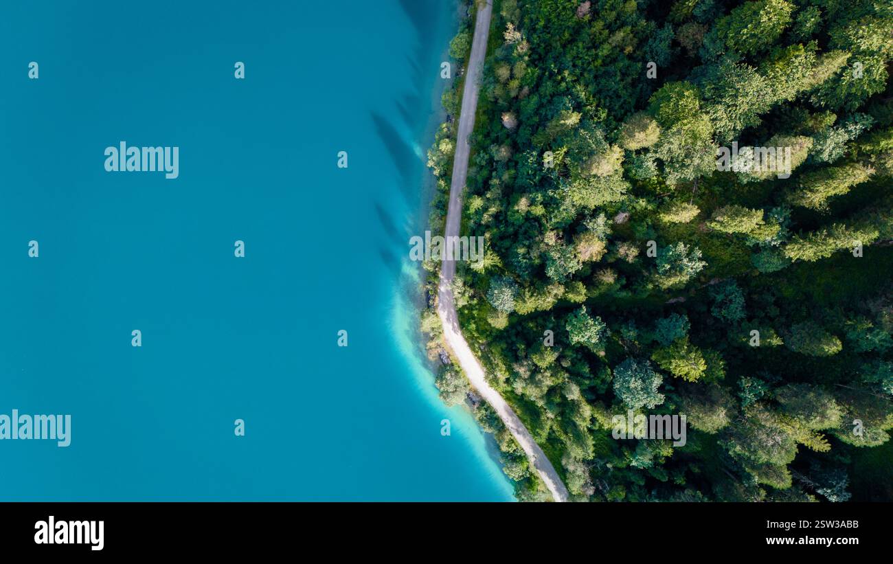 Nestled in the heart of the Austrian Alps, the crystal-clear waters of ...