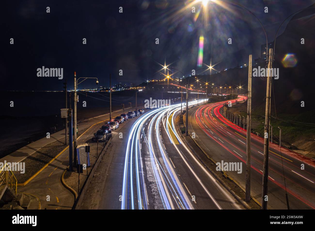 Lights at coastline from Maria Reiche Pedestrian Bridge, Miraflores ...
