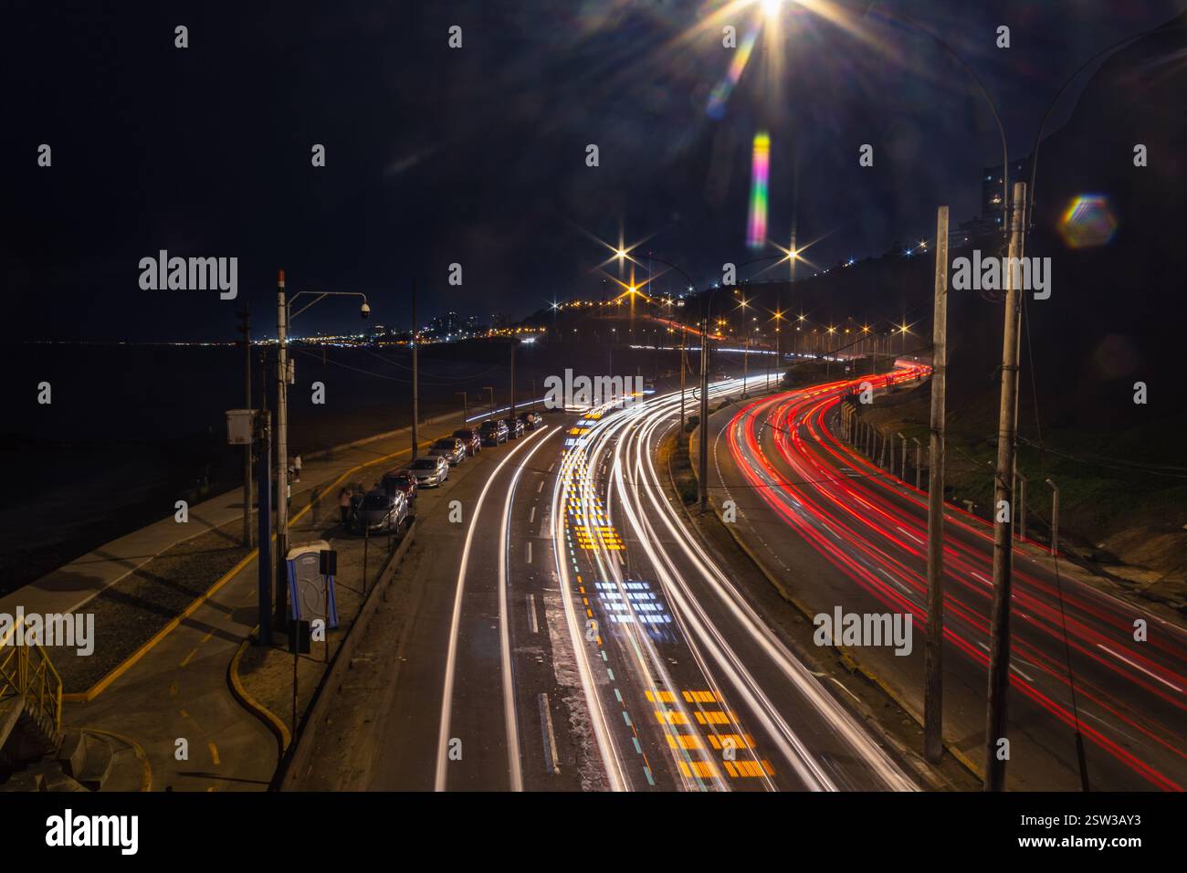 Lights at coastline from Maria Reiche Pedestrian Bridge, Miraflores ...