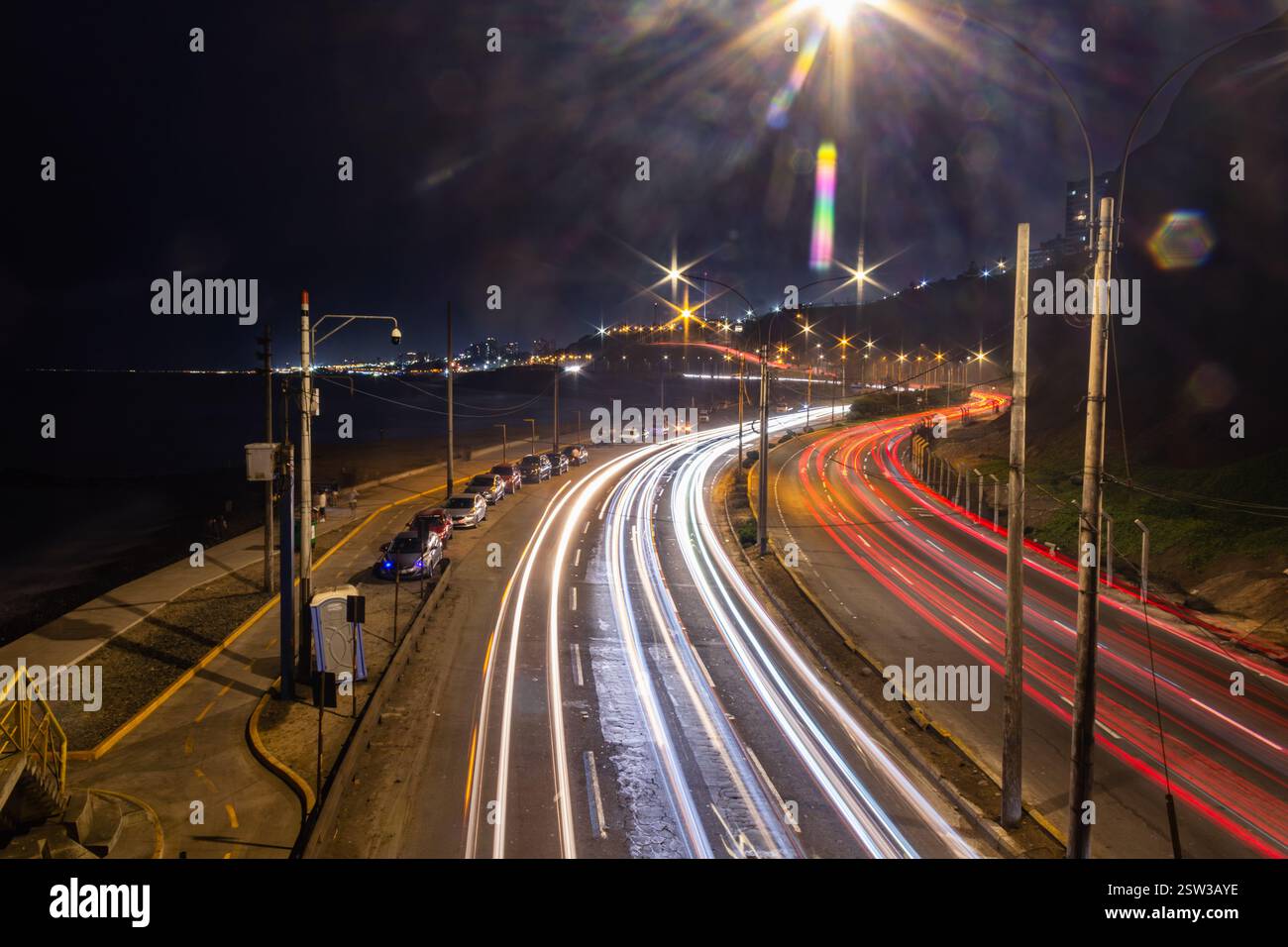 Lights at coastline from Maria Reiche Pedestrian Bridge, Miraflores ...