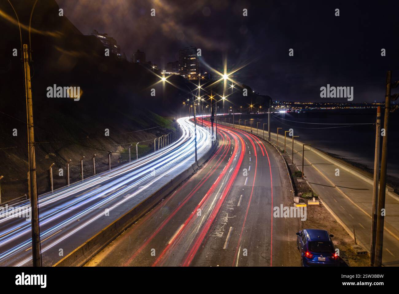 Lights at coastline from Maria Reiche Pedestrian Bridge, Miraflores ...