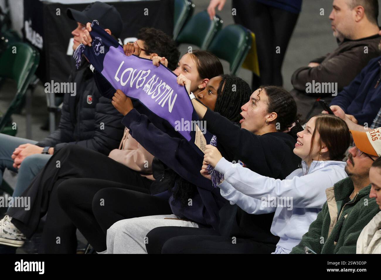 CEDAR PARK, TX - FEBRUARY 19: LOVB Austin fans hold up a team banner ...