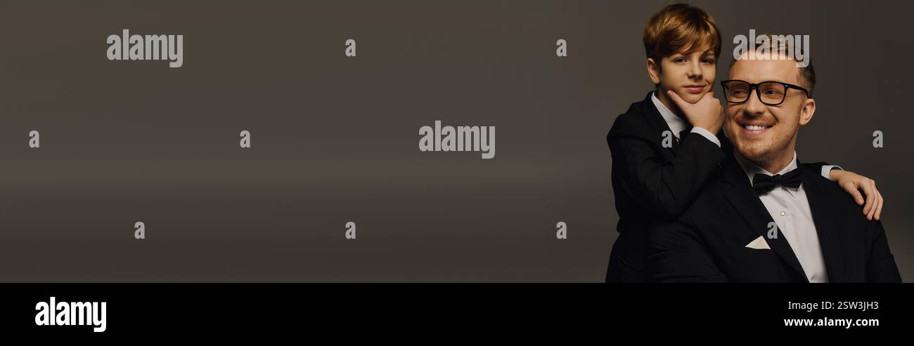 Dressed to impress, a handsome father shares a joyful moment with his ...