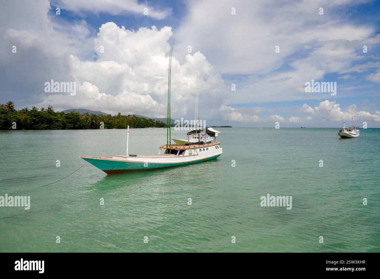 A colourful traditional Indonesian transport fishing boats on ...