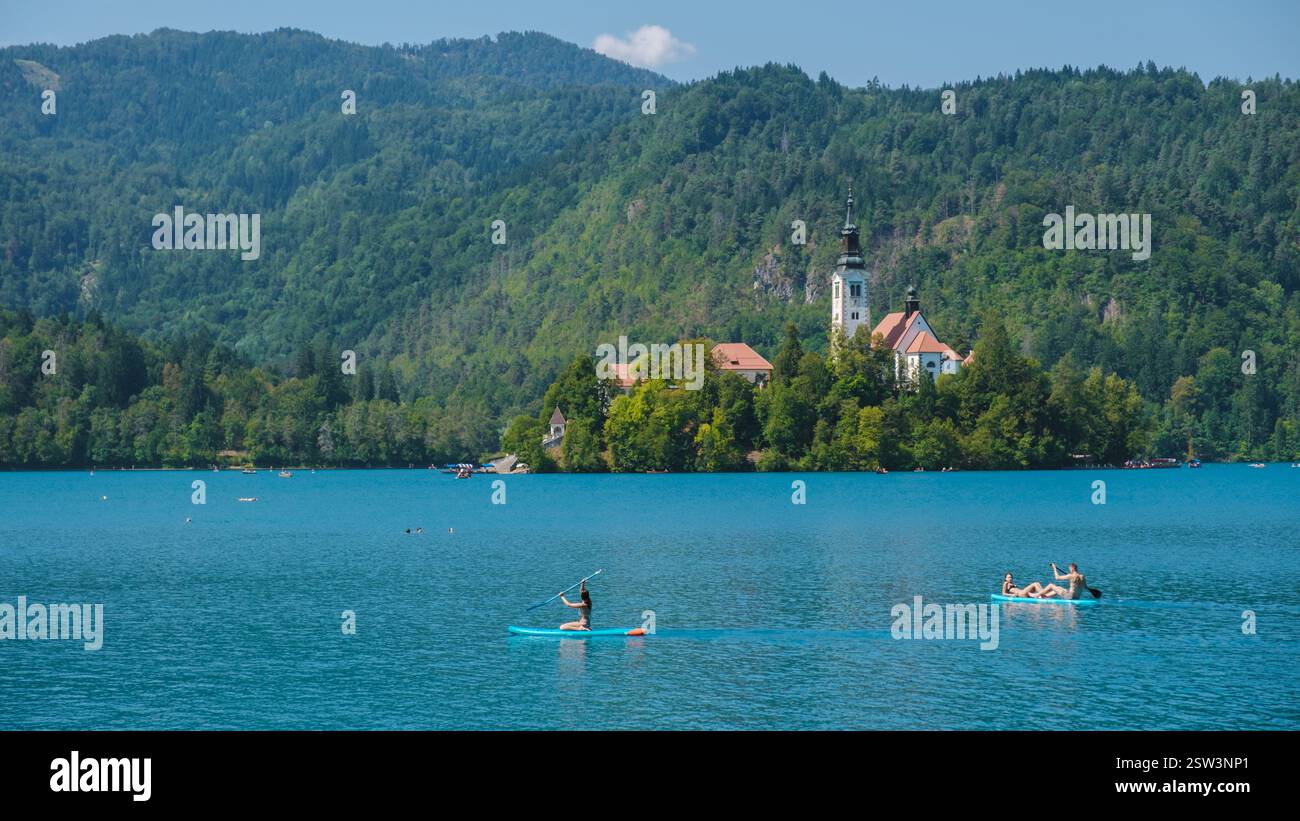 Exploring the tranquil waters of Lake Bled with paddleboarding and ...