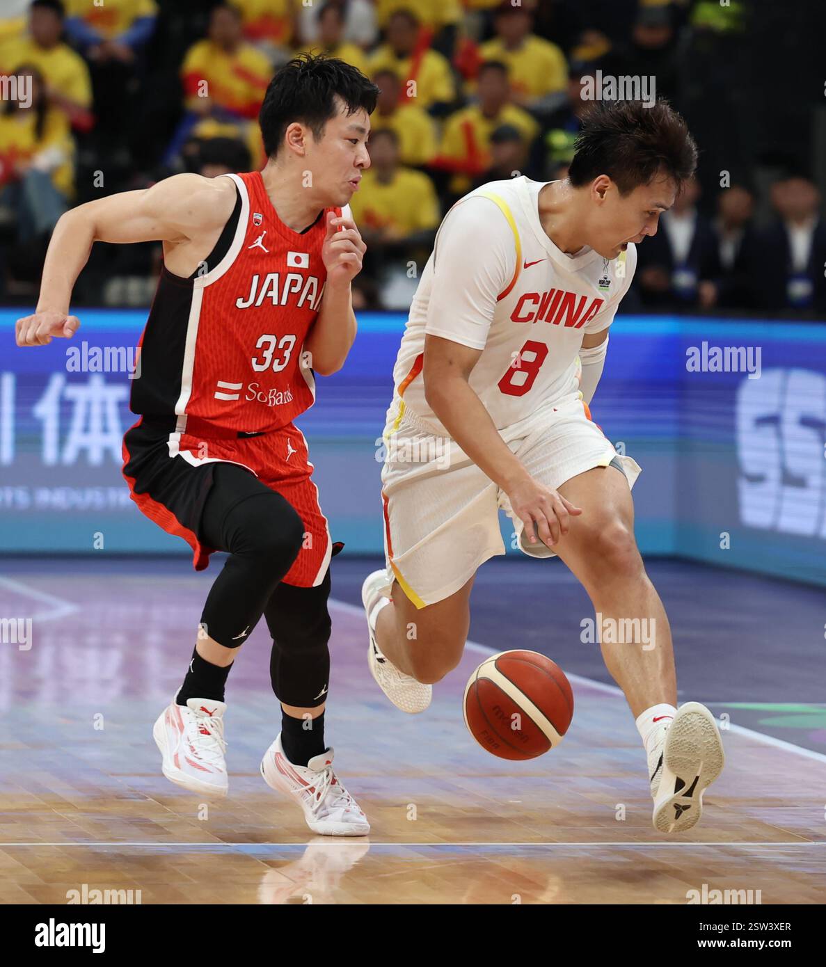 Shenzhen, China's Guangdong Province. 20th Feb, 2025. Zhao Rui (R) of ...