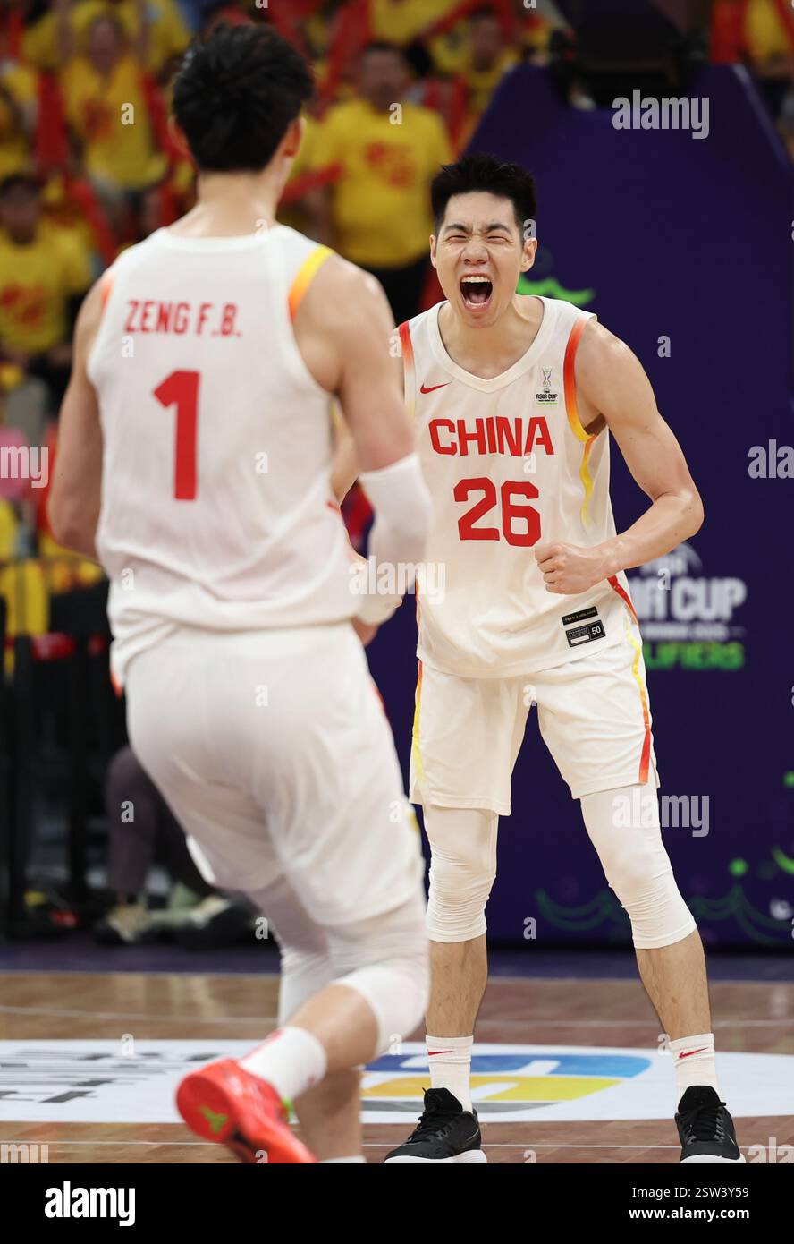 Shenzhen, China's Guangdong Province. 20th Feb, 2025. Zhu Junlong (R ...