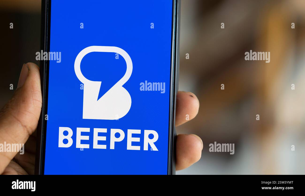 Dhaka, Bangladesh- 16 sep 2024: Beeper logo is displayed on smartphone. Beeper is an instant ...