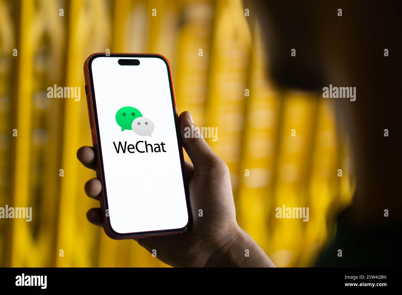Dhaka, bangladesh- 18 Sep 2024: WeChat logo is displayed on smartphone Stock Photo - Alamy