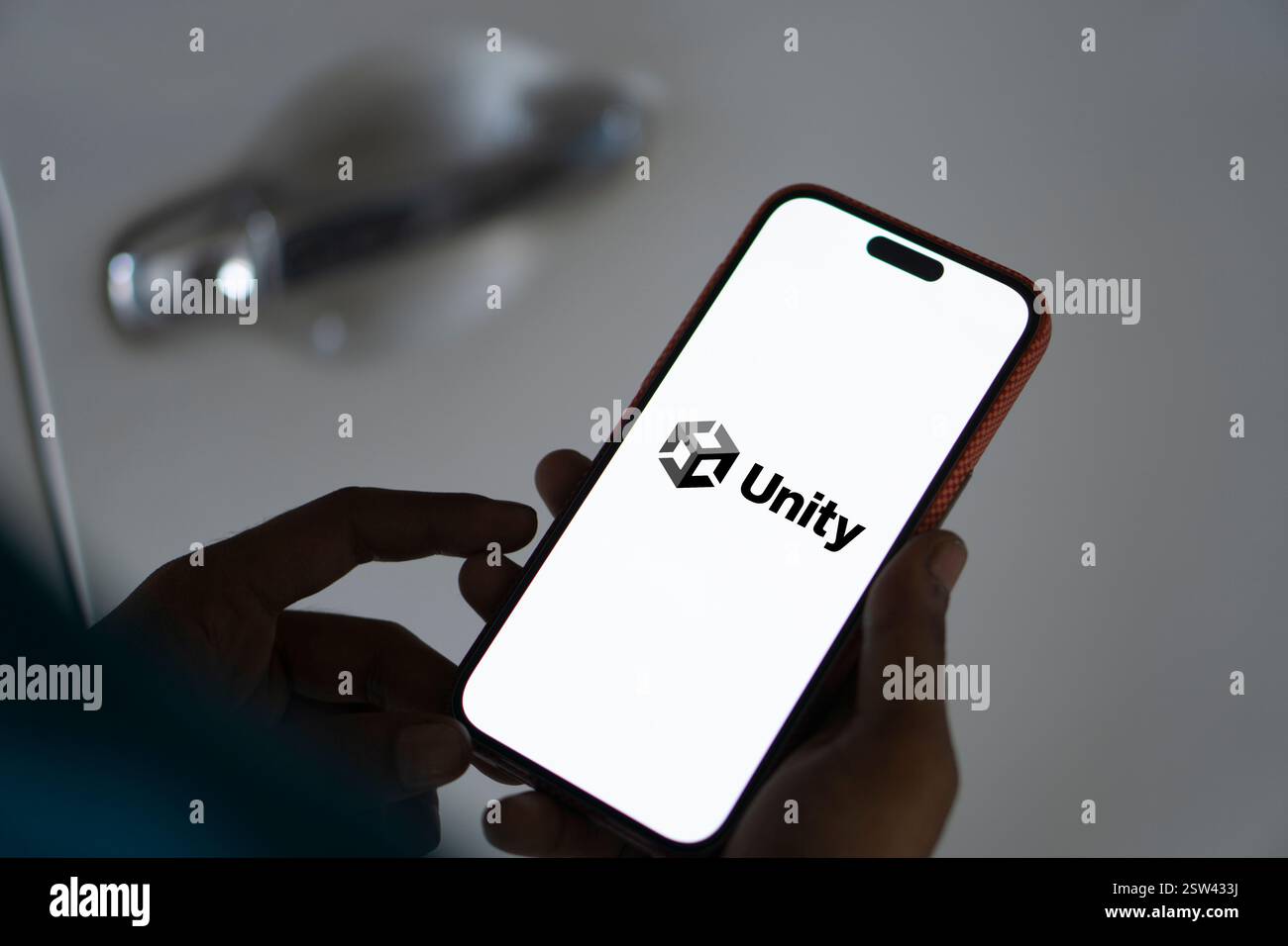 Dhaka, Bangladesh- 18 Sep 2024: Unity logo is displayed on smartphone. Unity is a cross-platform ...