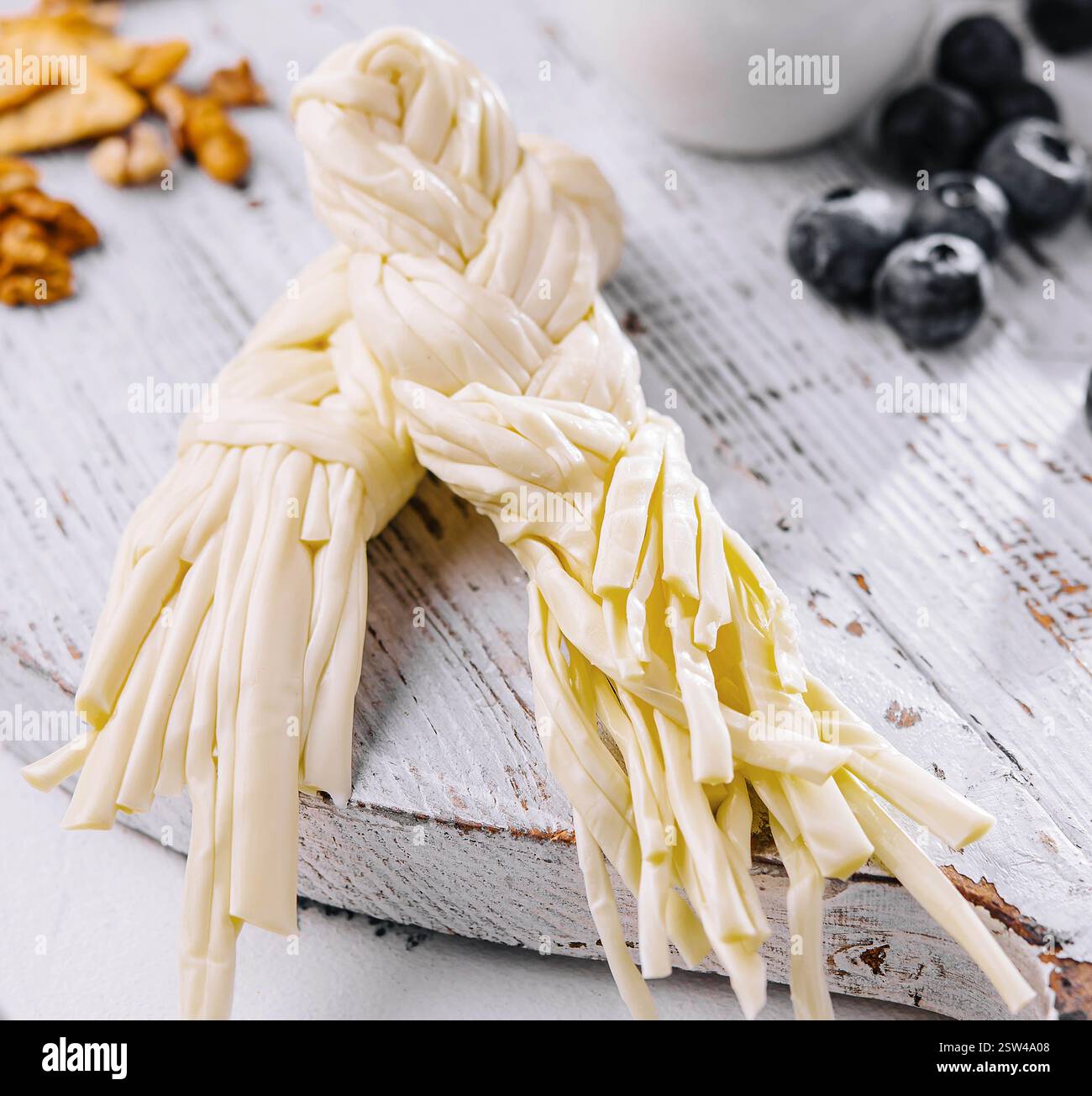 Traditional handmade Slovakian korbacik string Cheese Stock Photo - Alamy
