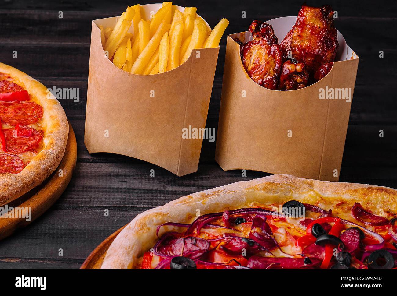 Table or delivery foods scene of assorted take out Stock Photo - Alamy