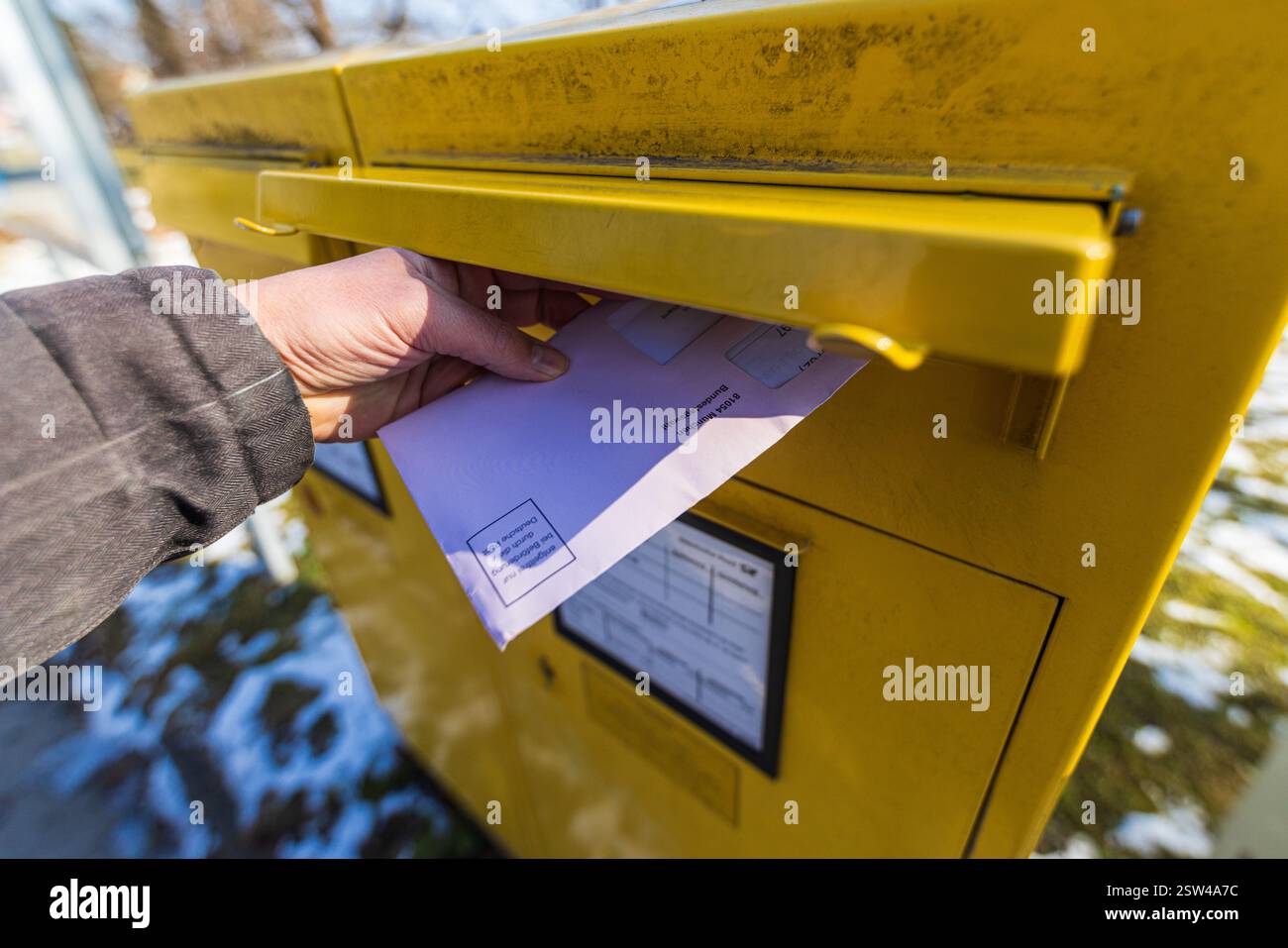 MUNICH, GERMANY - FEBRUARY 20, 2025: Postal voting for the 2025 federal ...