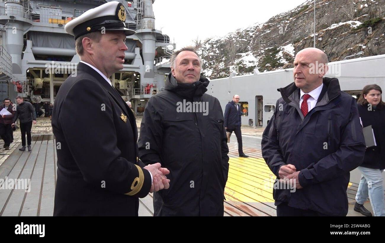 Screen grab taken from PA Video of Defence Secretary John Healey (right ...