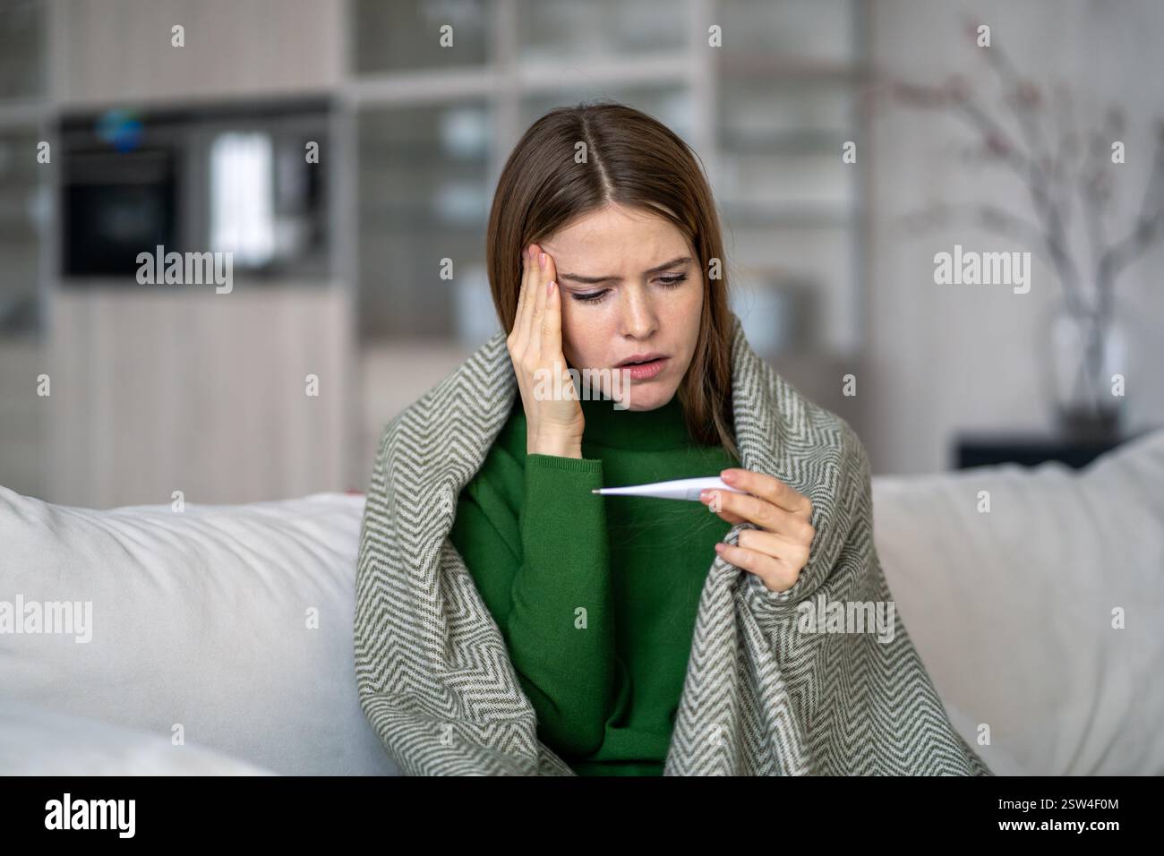 Woman feeling unwell, having symptoms of flu, virus, suffering from ...