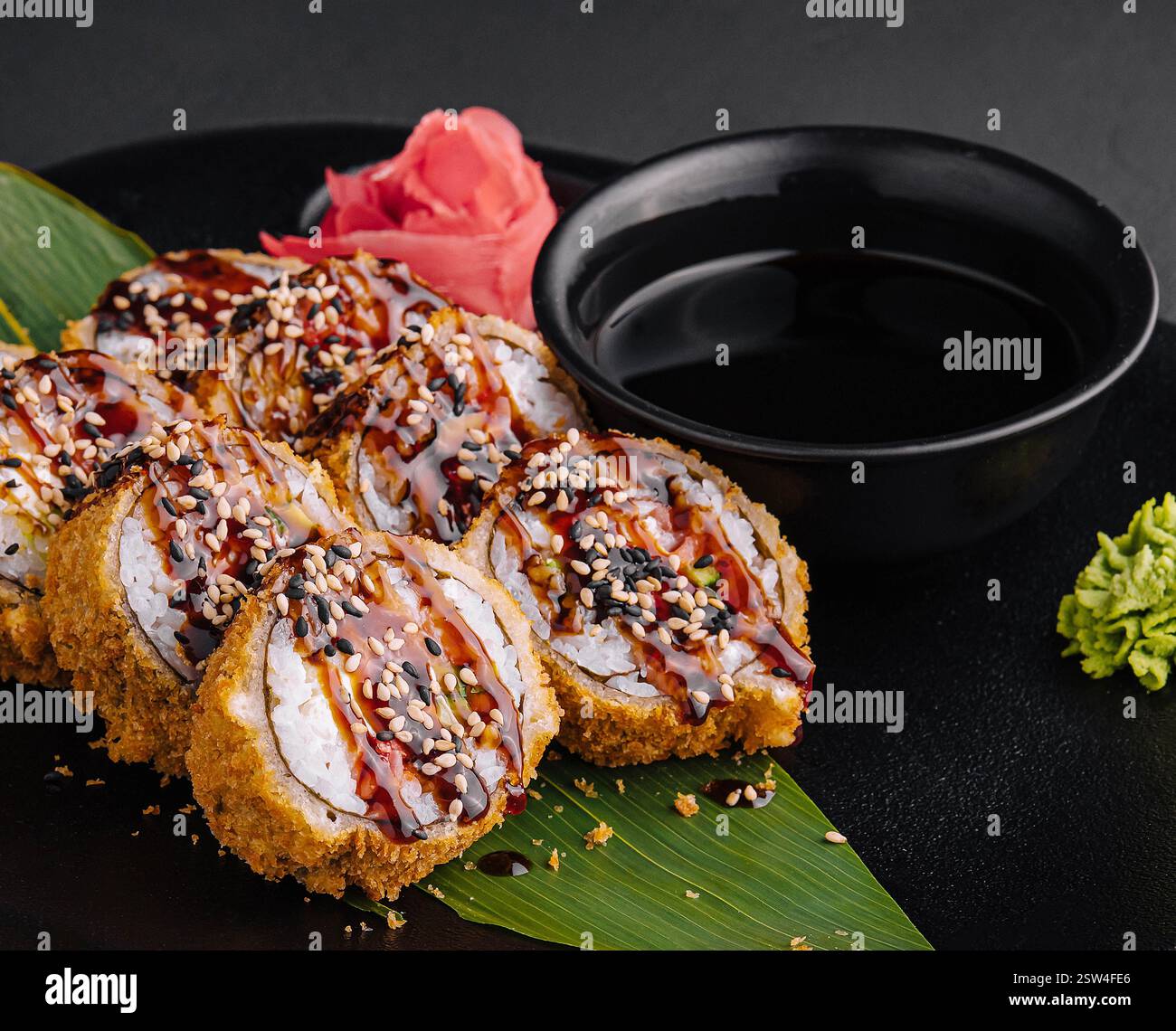 Warm sushi roll with unagi sauce Stock Photo - Alamy