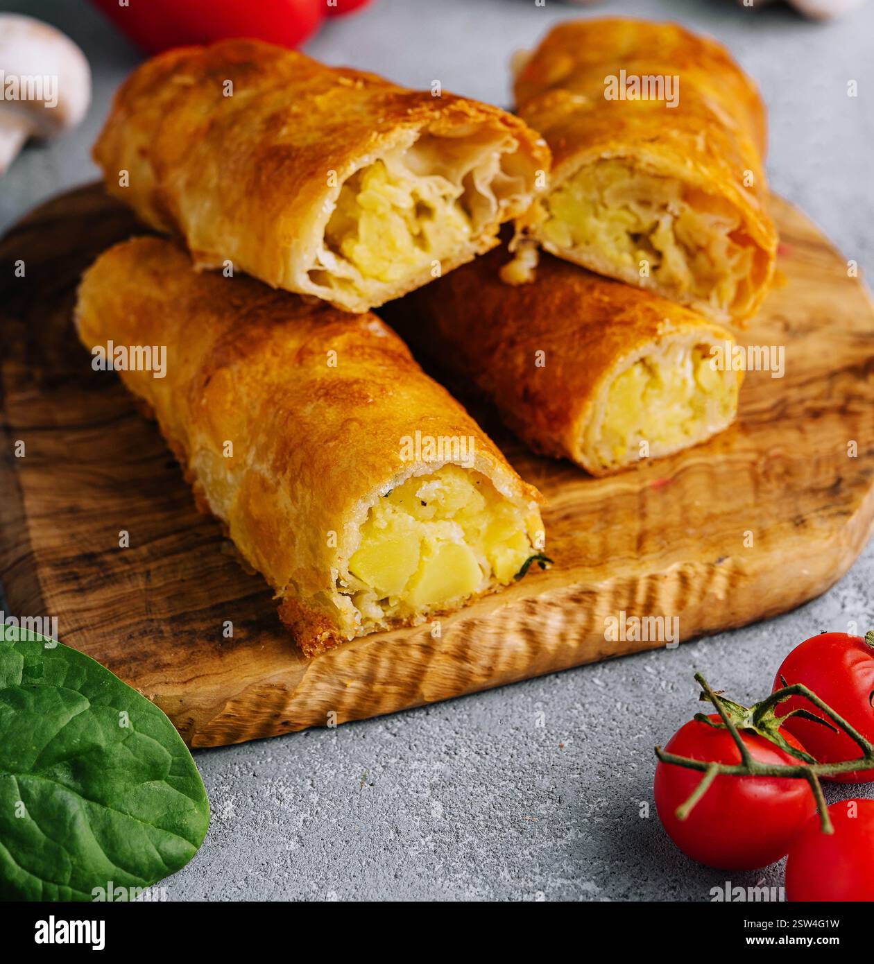 Baking puff pastry with potatoes in the cut Stock Photo - Alamy