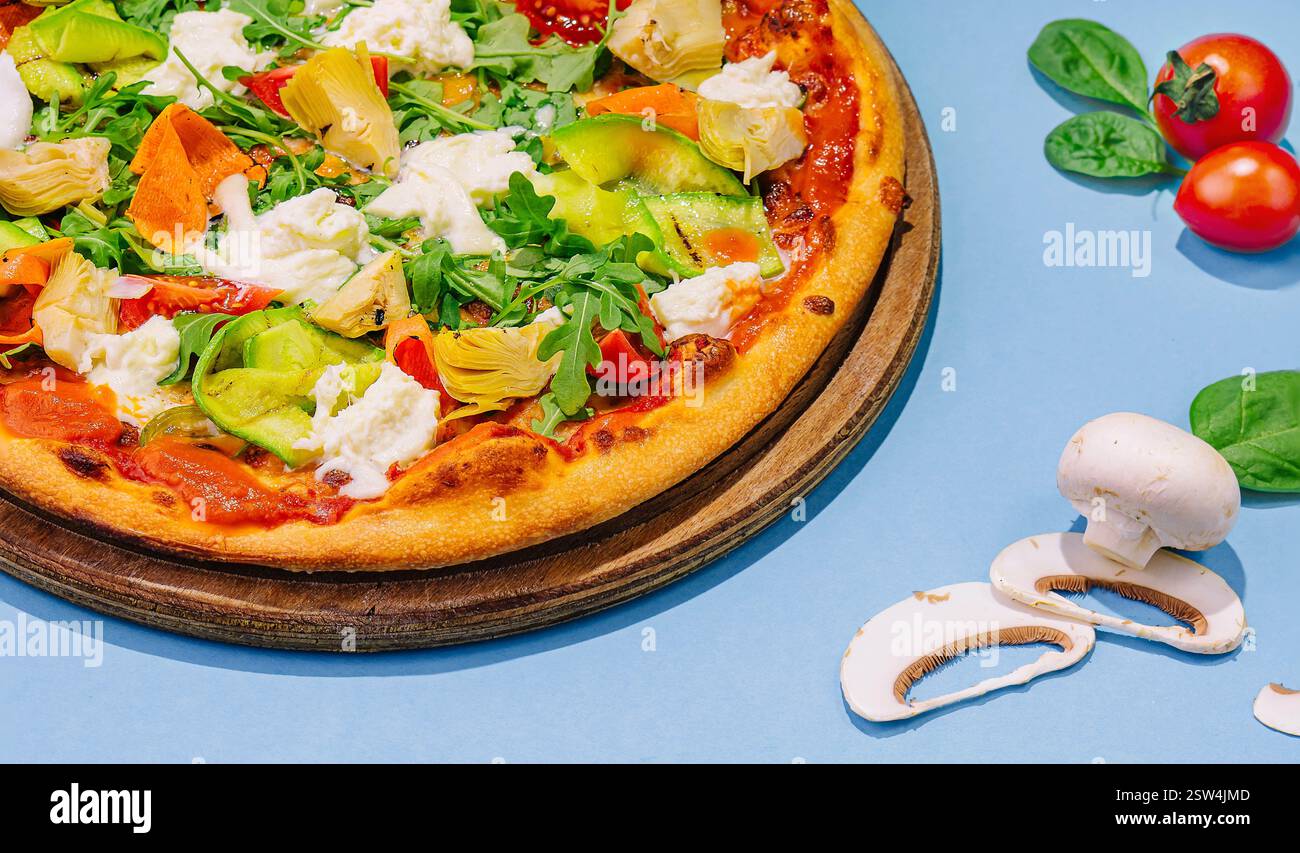 Fresh pizzas on blue hi-res stock photography and images - Alamy