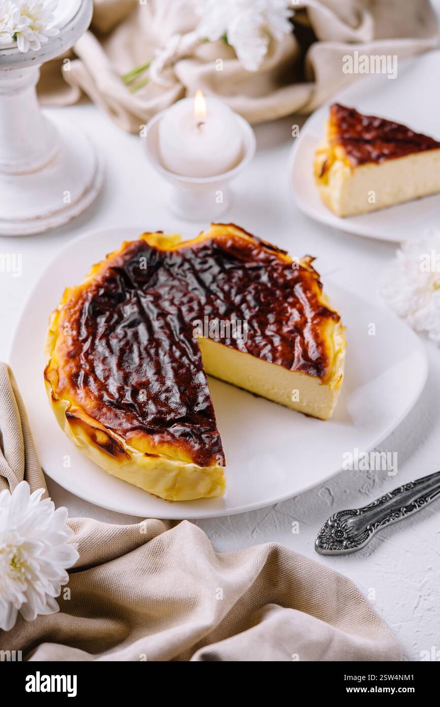 Traditional basque burnt san sebastian cheesecake slice on elegant ...