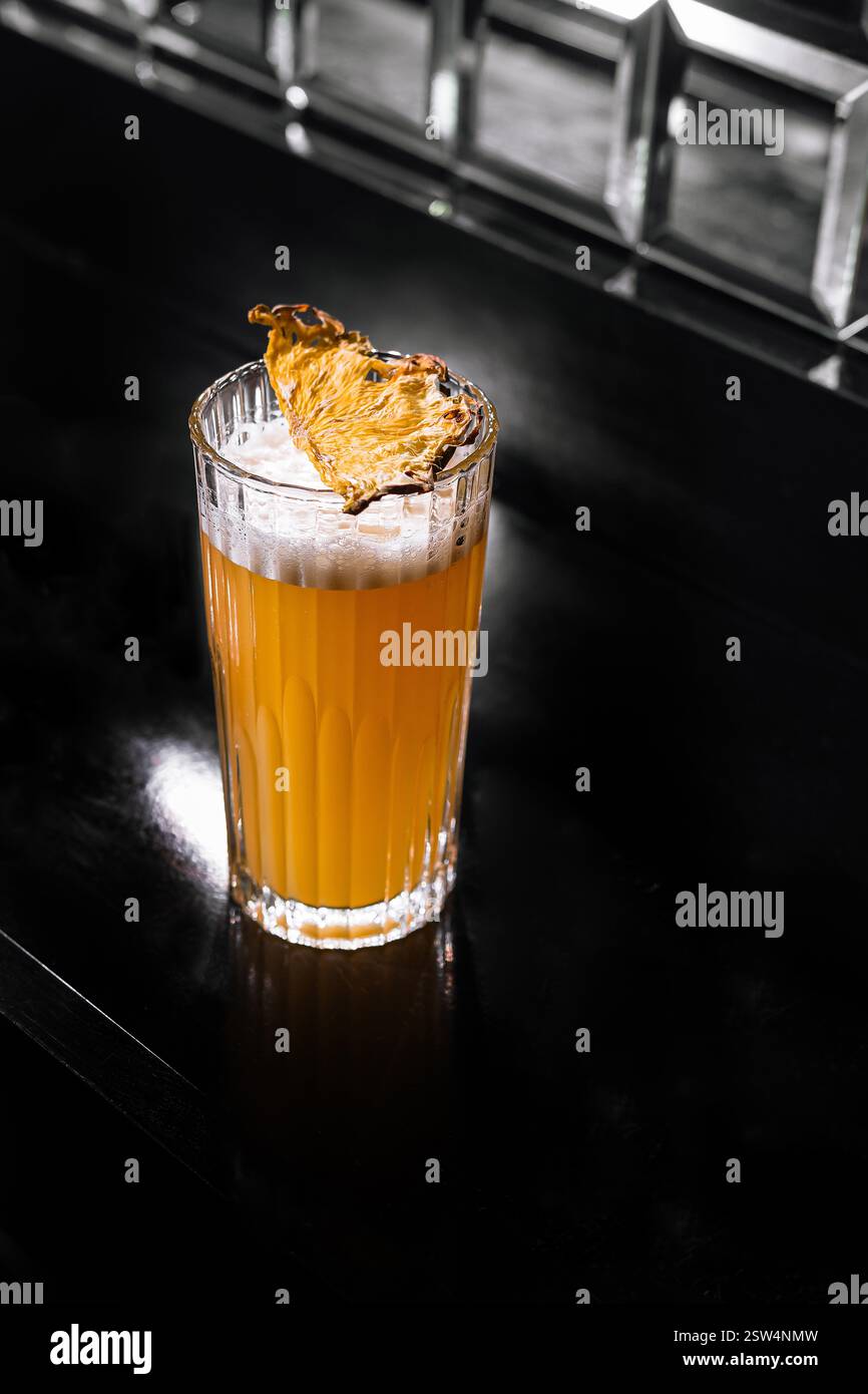 Dynamic splash in glass of orange juice Stock Photo - Alamy