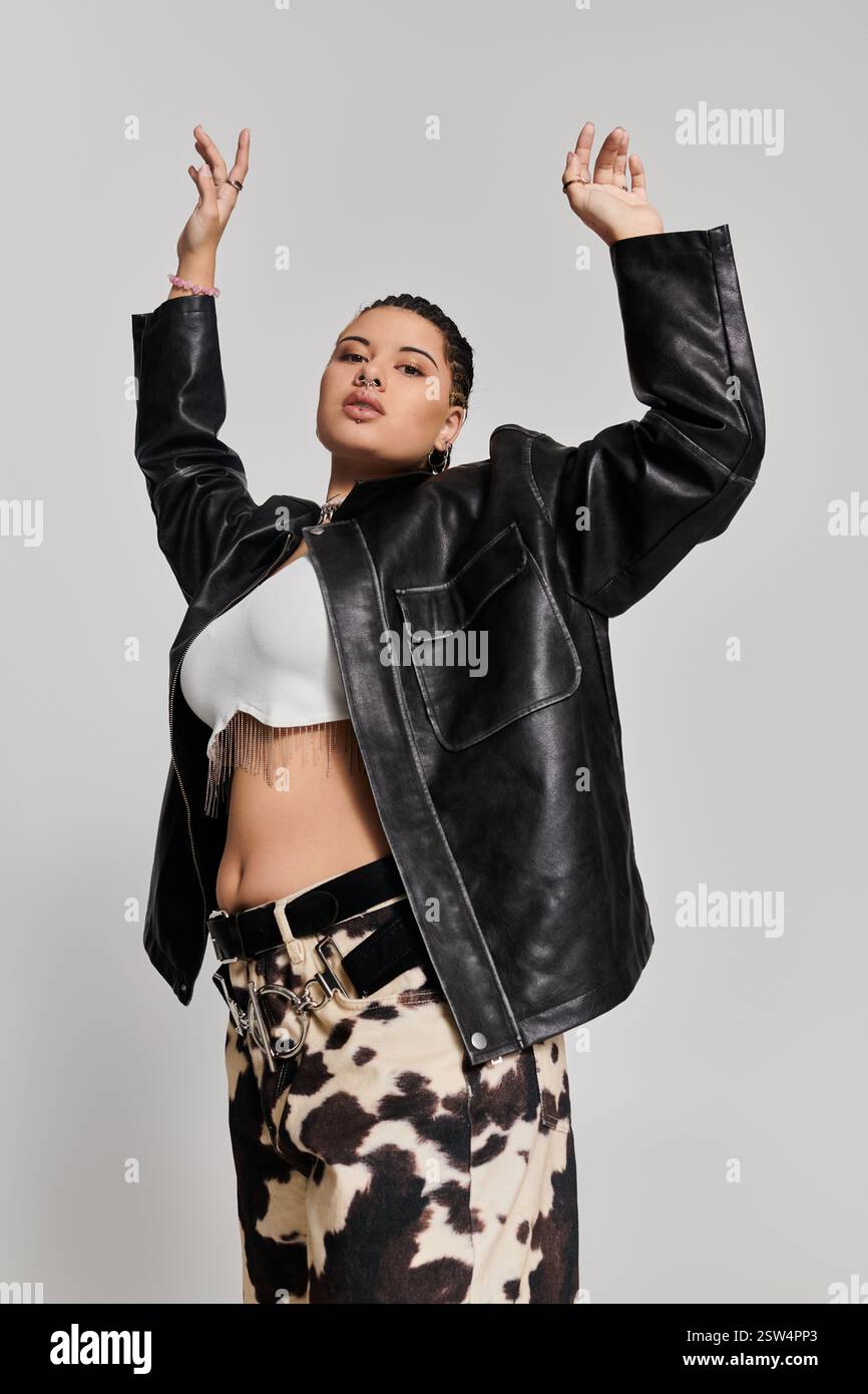 A young woman in a bold outfit displays her unique style and confidence ...