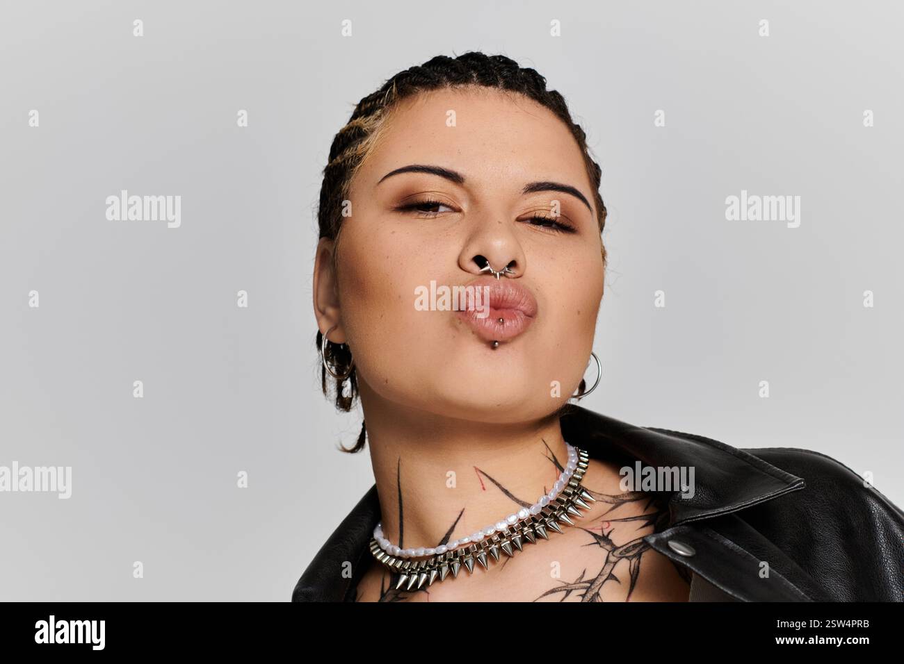 Confident young woman shows unique style with braids and bold ...