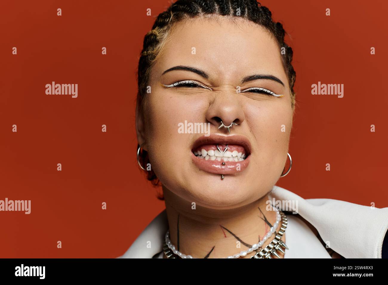 Confident young woman showcases her unique style with bold accessories ...