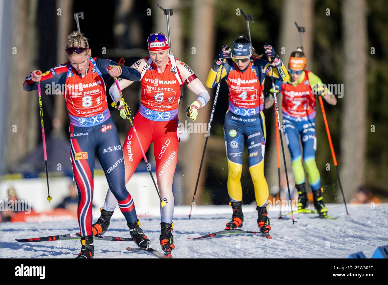 From left, Ragnhild Femsteinevik of Norway, Amy Baserga of Switzerland ...
