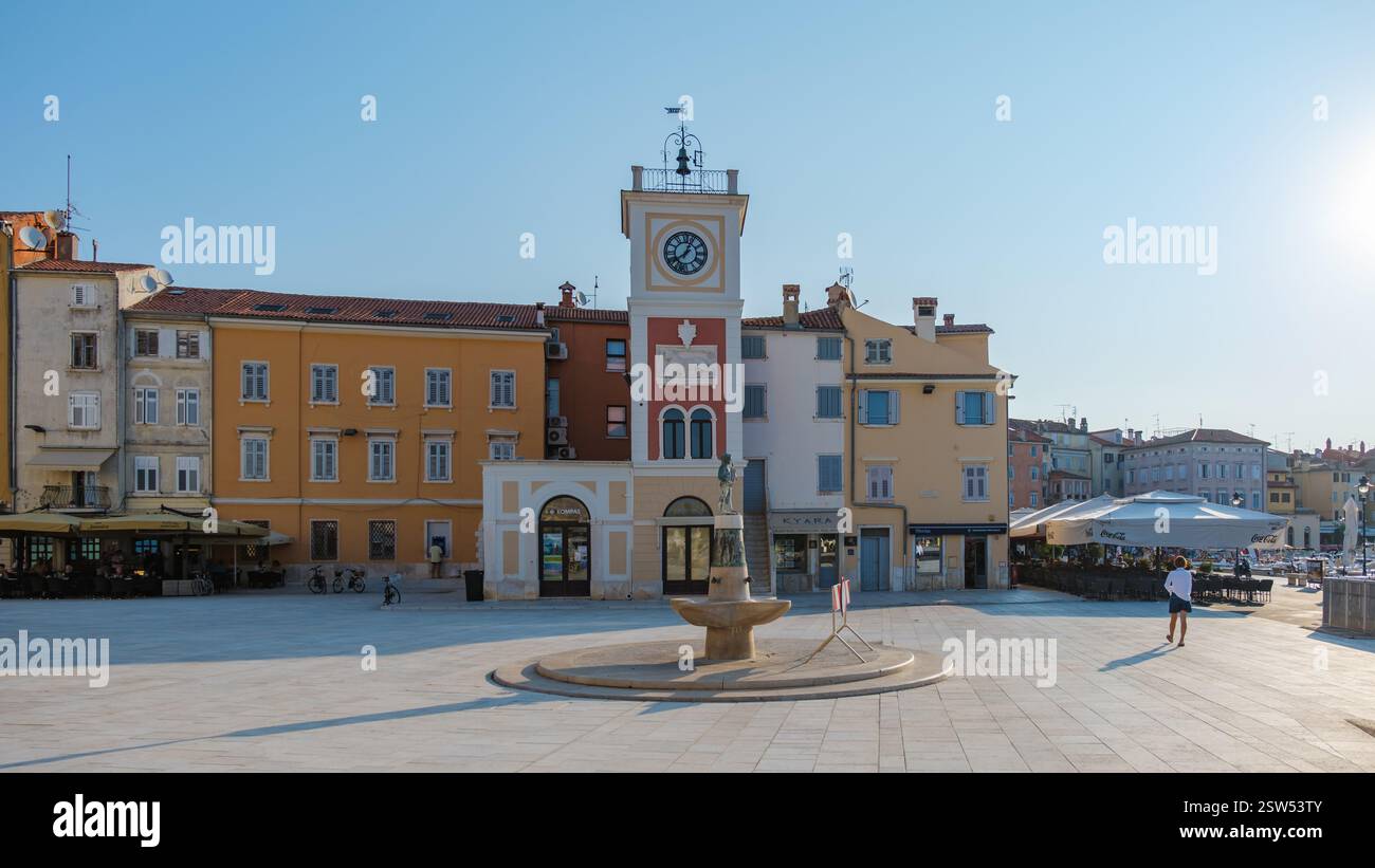 A bright morning in Rovinj, Croatia, showcasing vibrant buildings and a ...