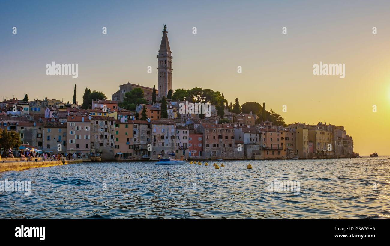 Breathtaking sunset over the picturesque harbor of Rovinj, Croatia with ...