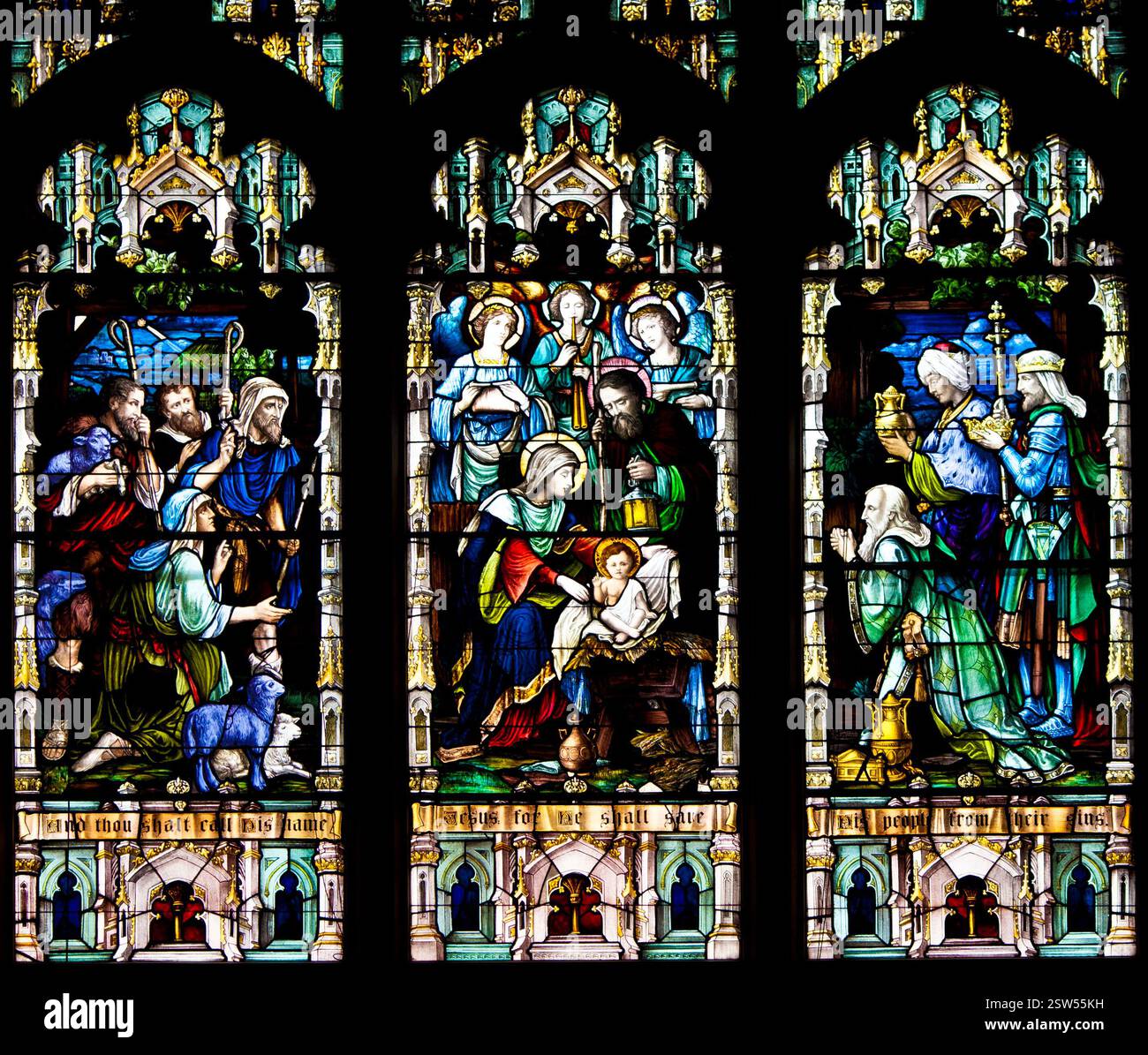 The stained glass window depicts the Nativity scene with Jesus, Mary ...