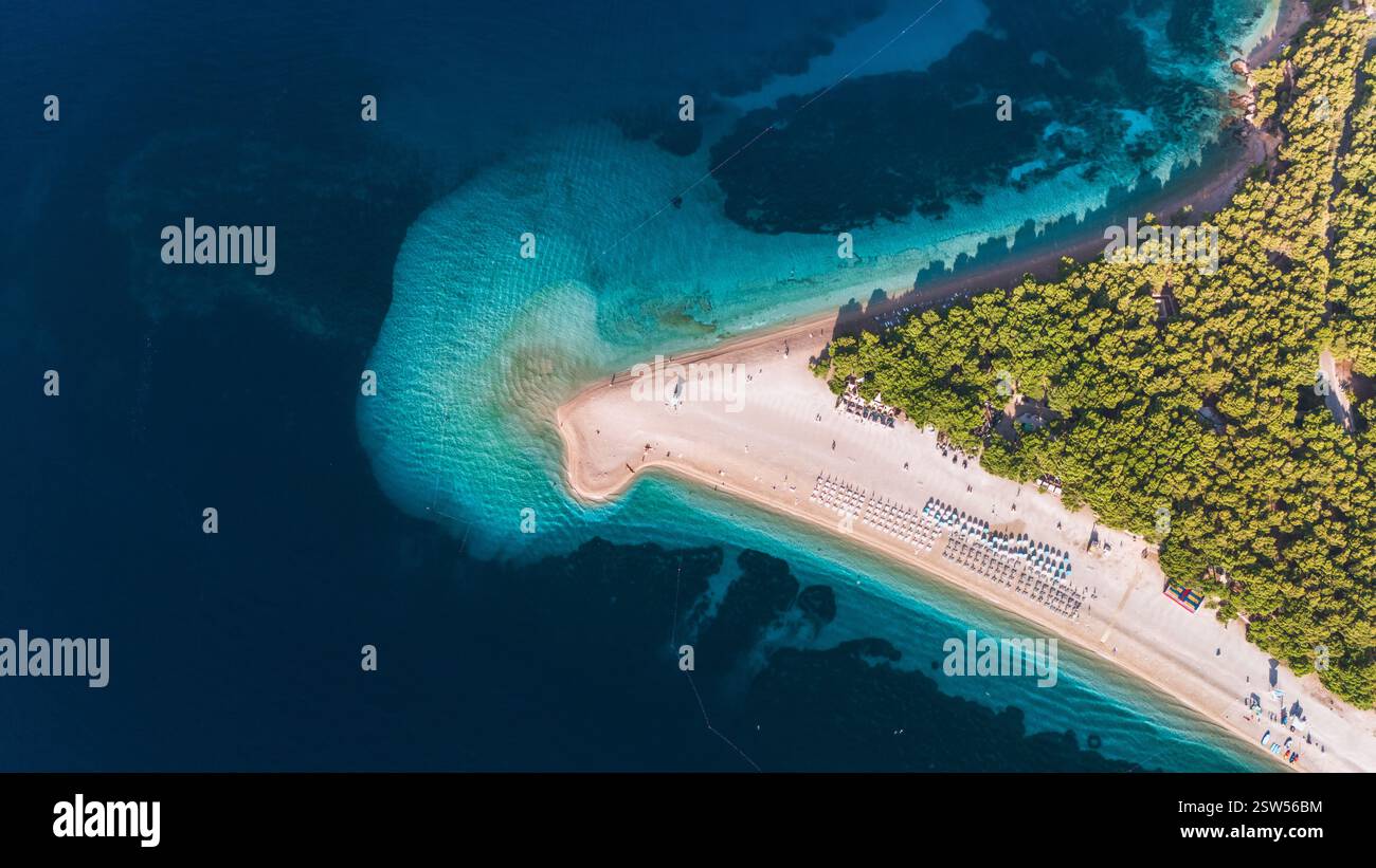 Aerial view of Zlatni Rat beach on Brac Island, Croatia, with clear ...