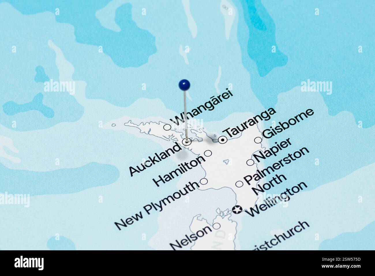 blue pin needle into auckland city of New Zealand political map Stock ...
