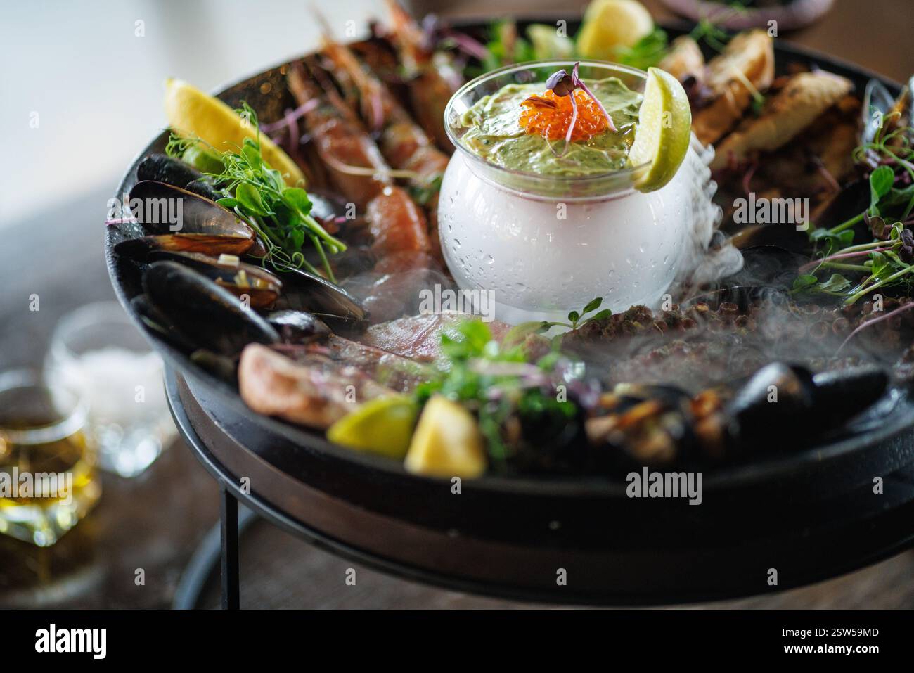 Exquisite seafood platter featuring grilled shrimp, mussels, octopus ...