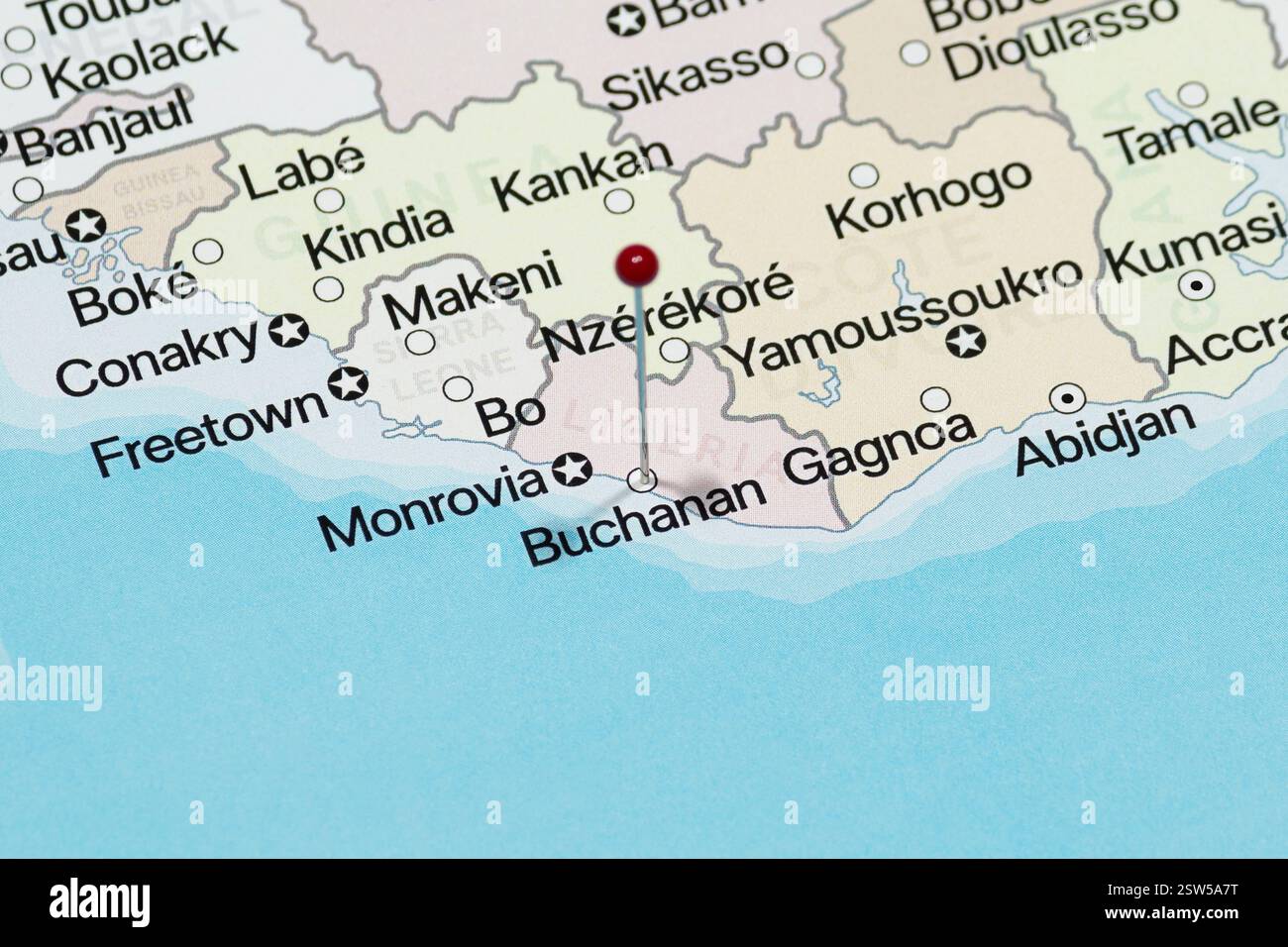 red pin needle into buchanan city of liberia political map Stock Photo ...