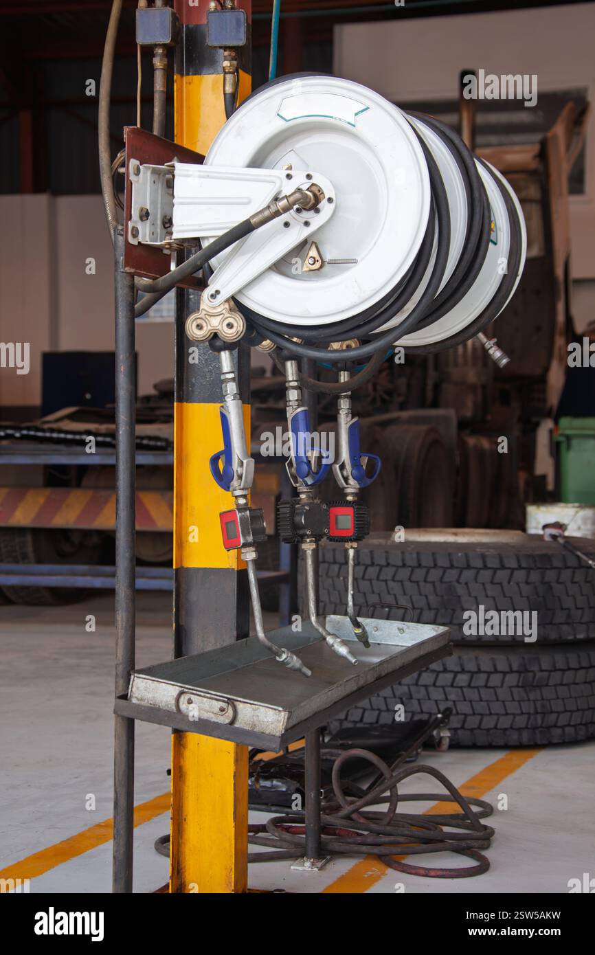 Pneumatic hose reel hi-res stock photography and images - Alamy