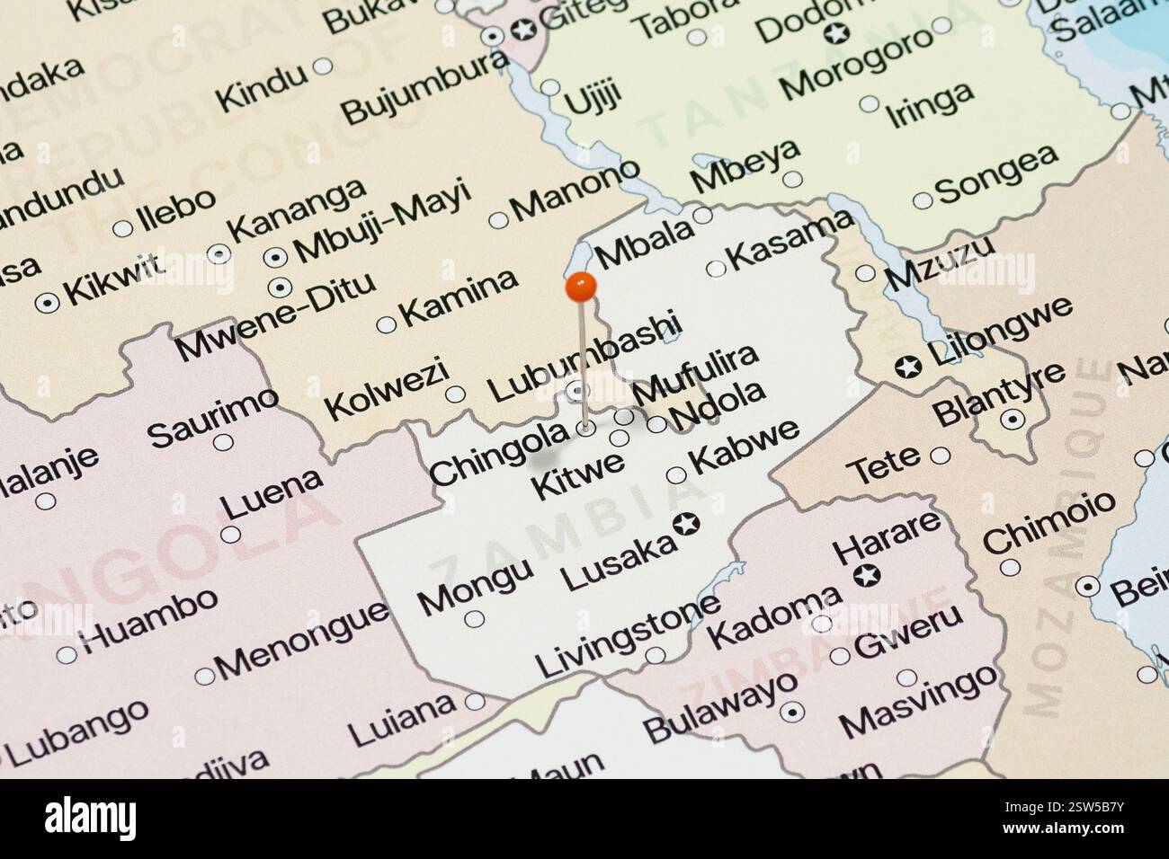 an orange pin needle into chingola city of zambia political map Stock ...