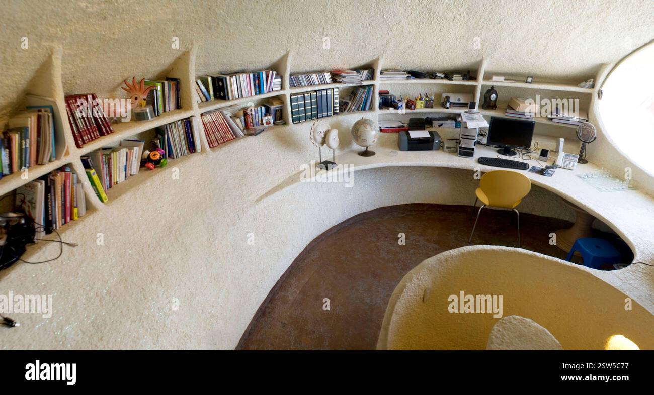 Studio at the unusual shell-shaped house built by Senosian Arquitectos ...