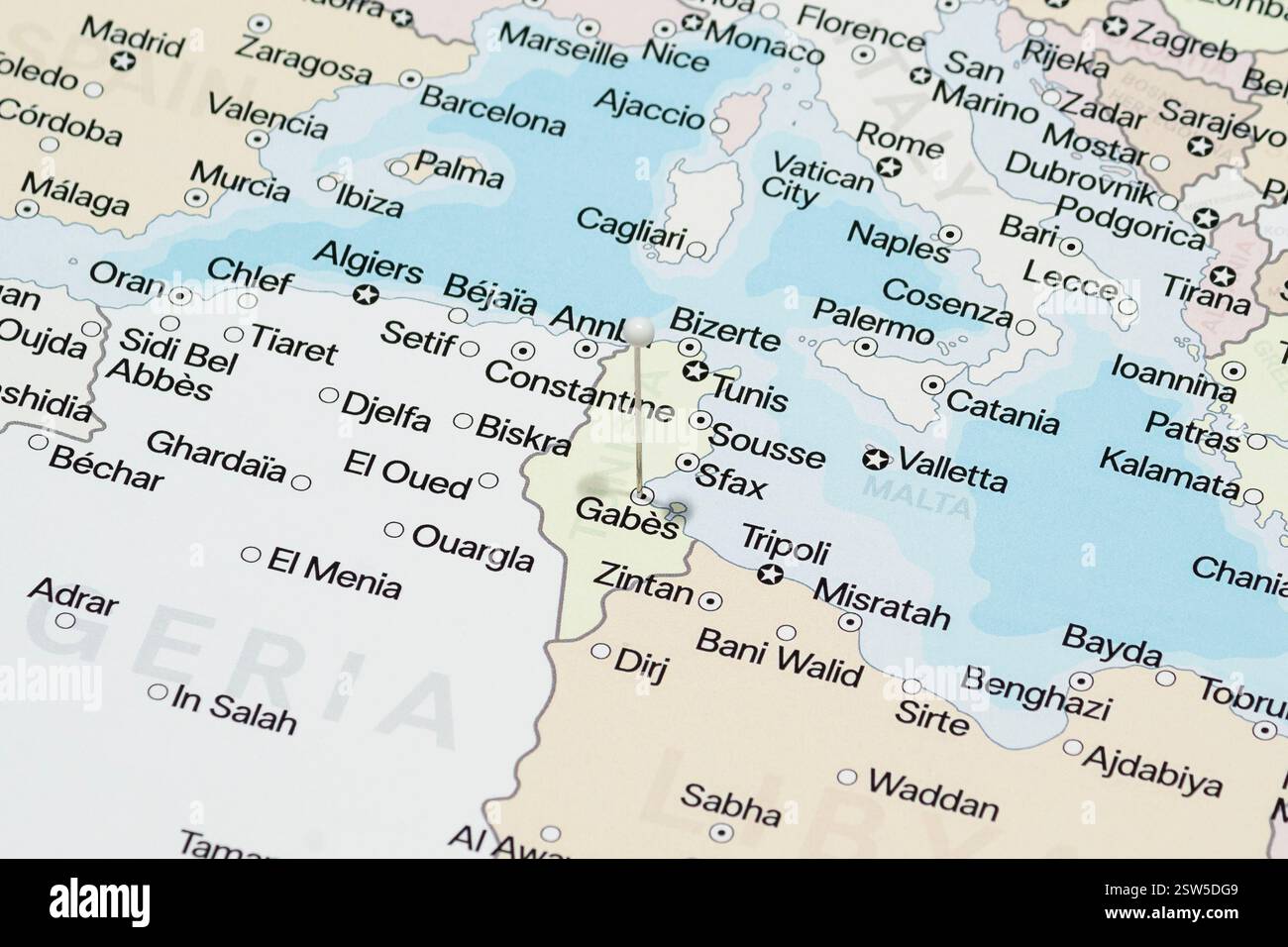 Macro photo of a white pin needle into gabes city of tunisia political ...