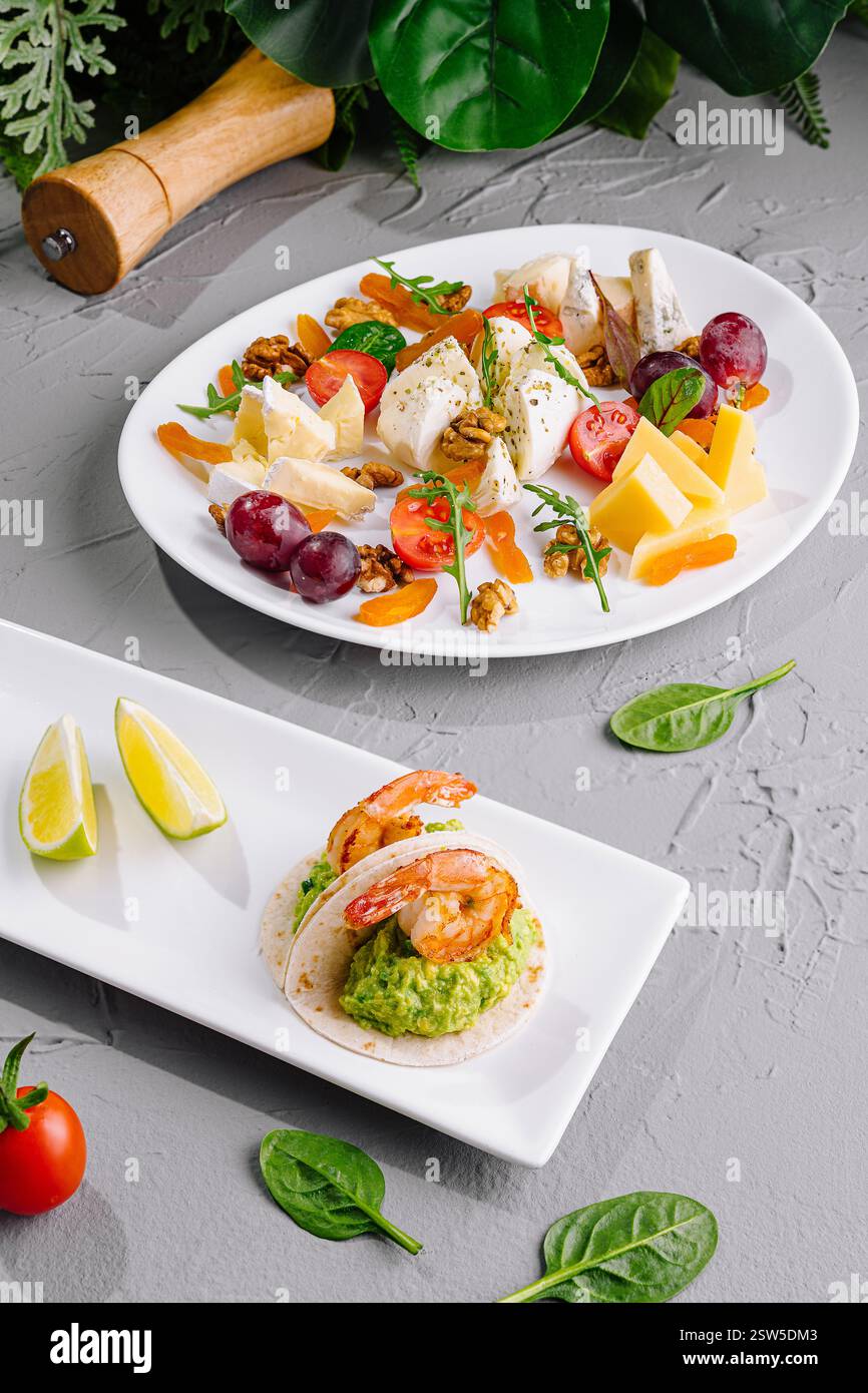 Gourmet appetizer platter with shrimp and cheese Stock Photo - Alamy
