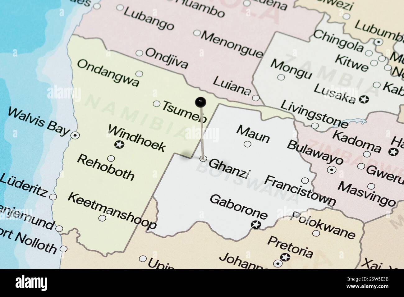 Macro photo of a black pin needle into ghanzi city of botswana ...