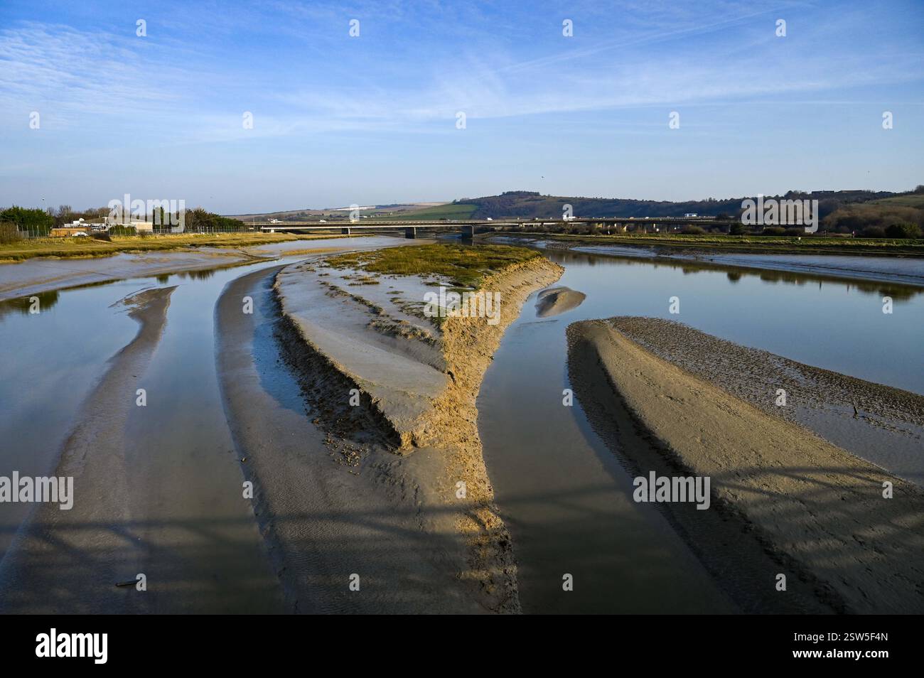 The River Adur at low tide on sunny winter morning in West Sussex UK ...