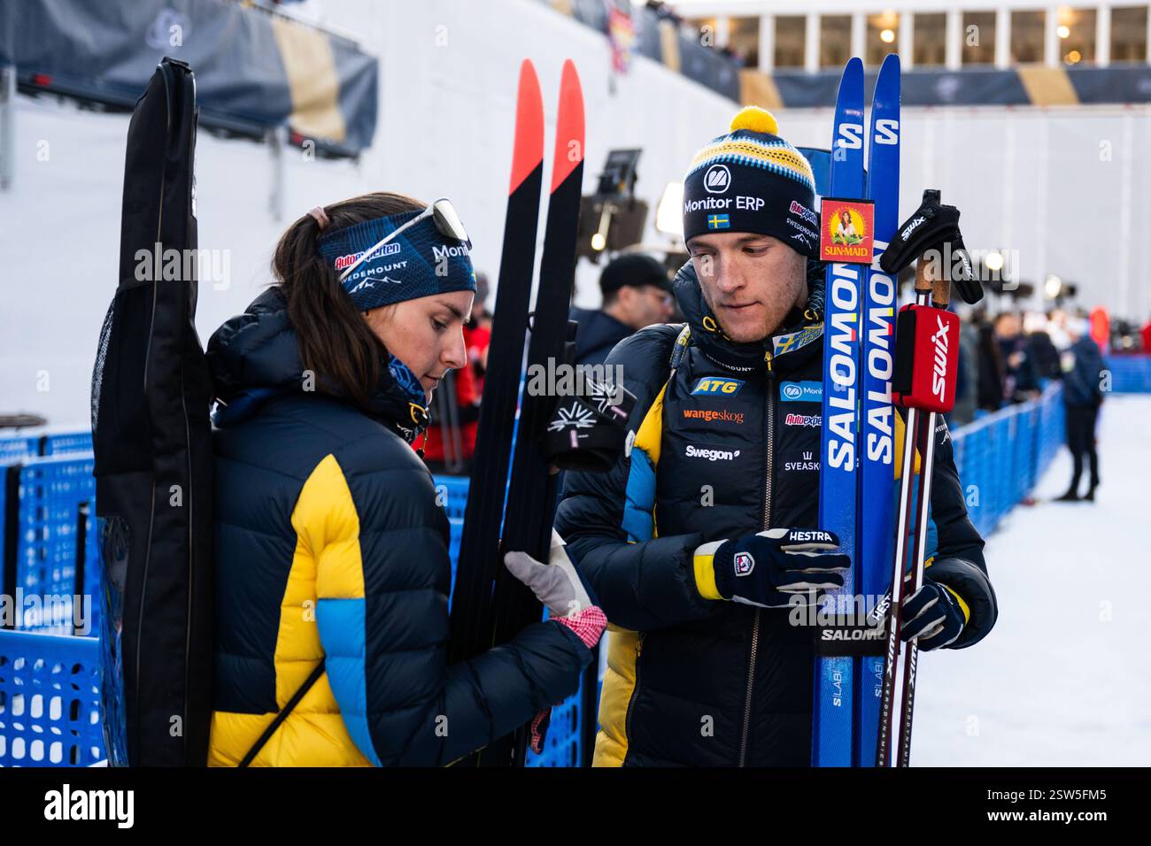250220 Ella Halvarsson and Sebastian Samuelsson of Sweden after the ...