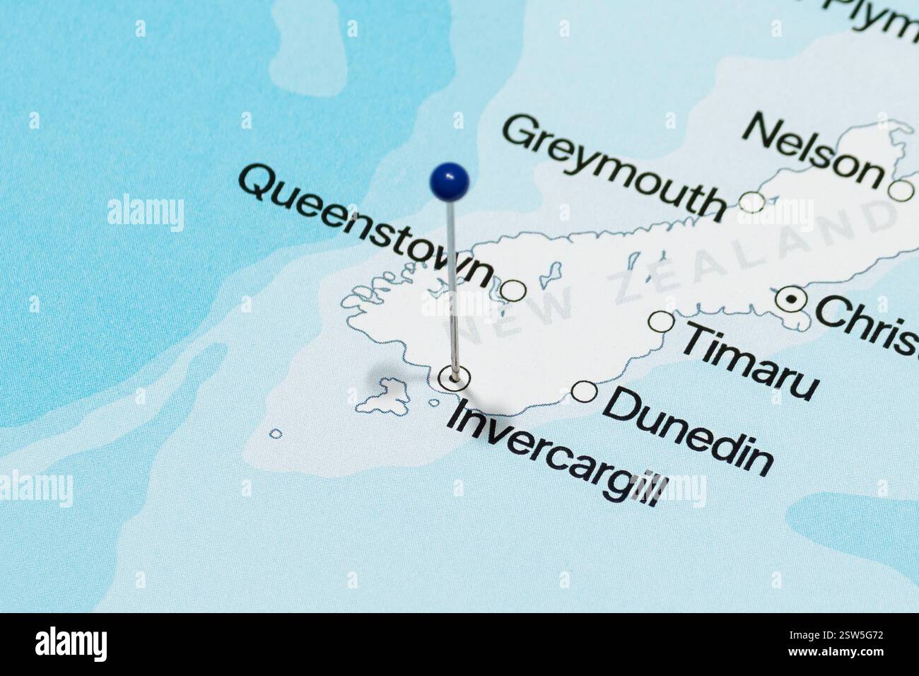 blue pin needle into invercargill city of new zealand political map ...