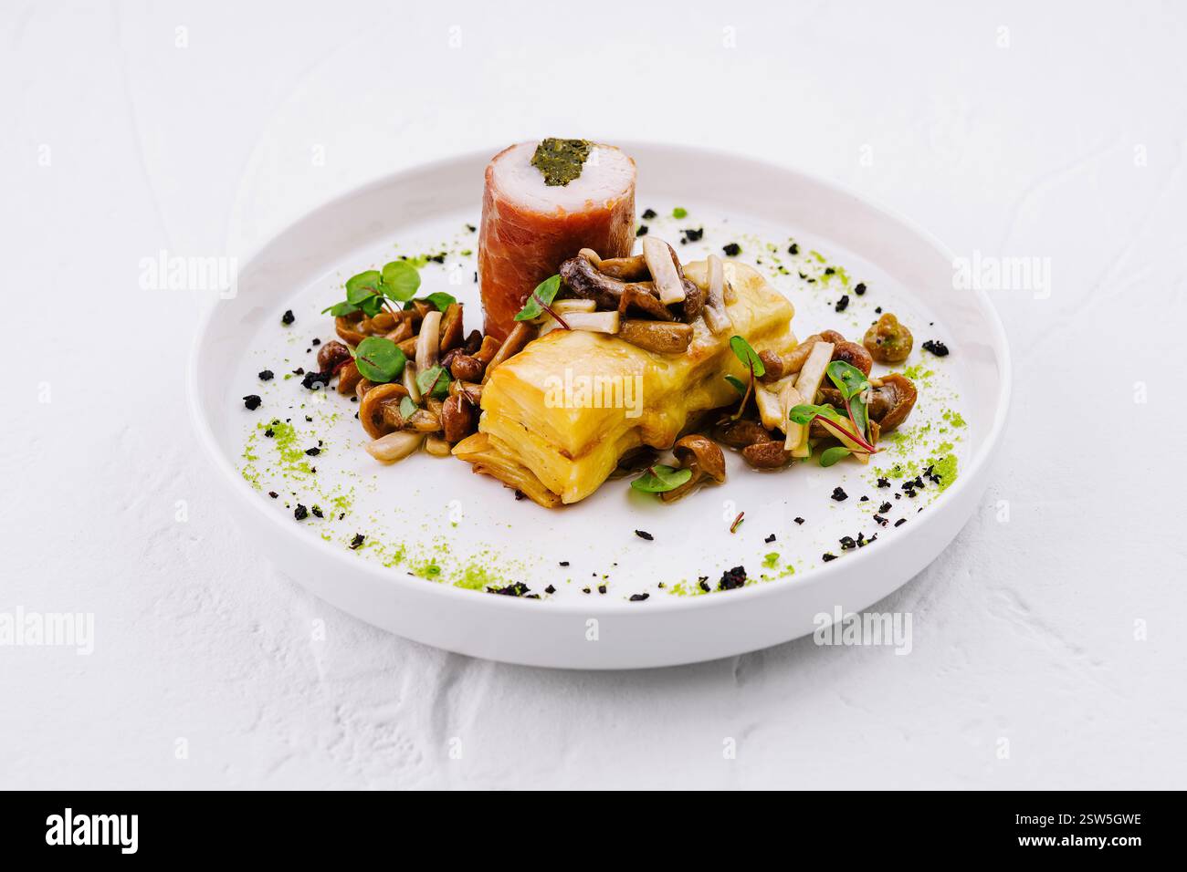 Gourmet stuffed chicken with vegetables on plate Stock Photo - Alamy