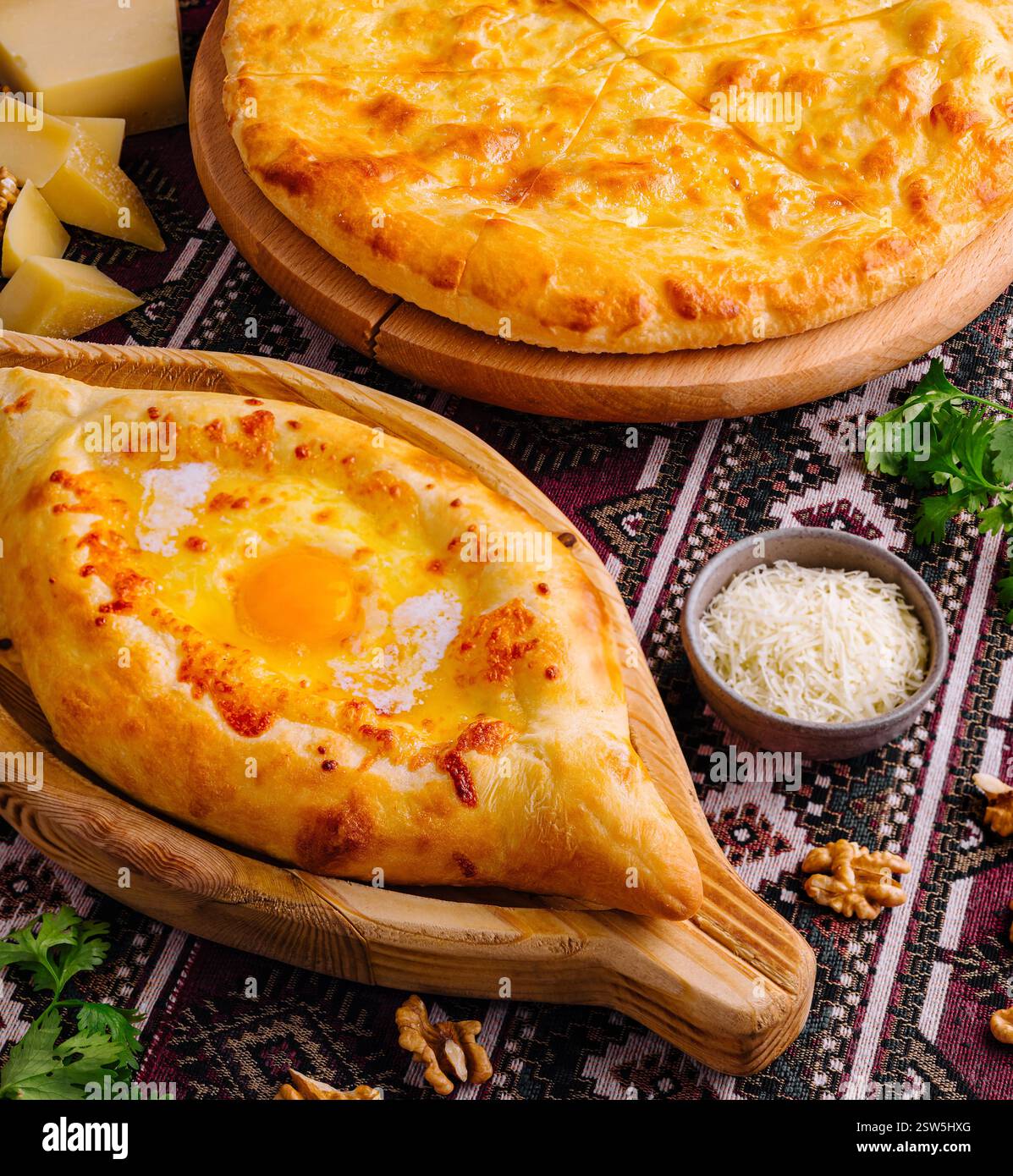 Traditional georgian cuisine: khachapuri and pizza Stock Photo - Alamy