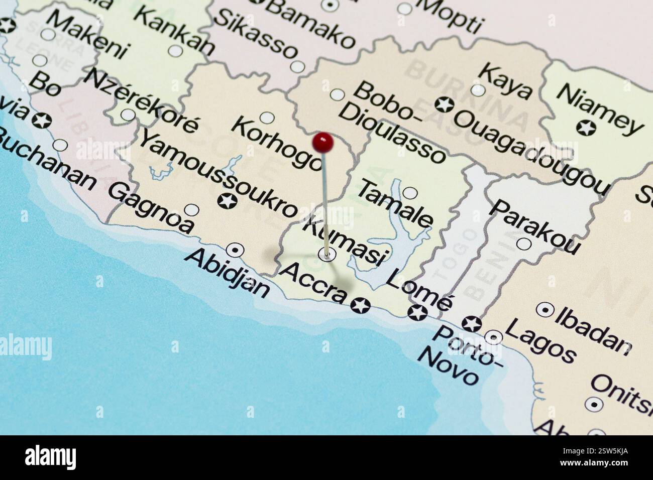 red pin needle into kumasi city of ghana political map Stock Photo - Alamy